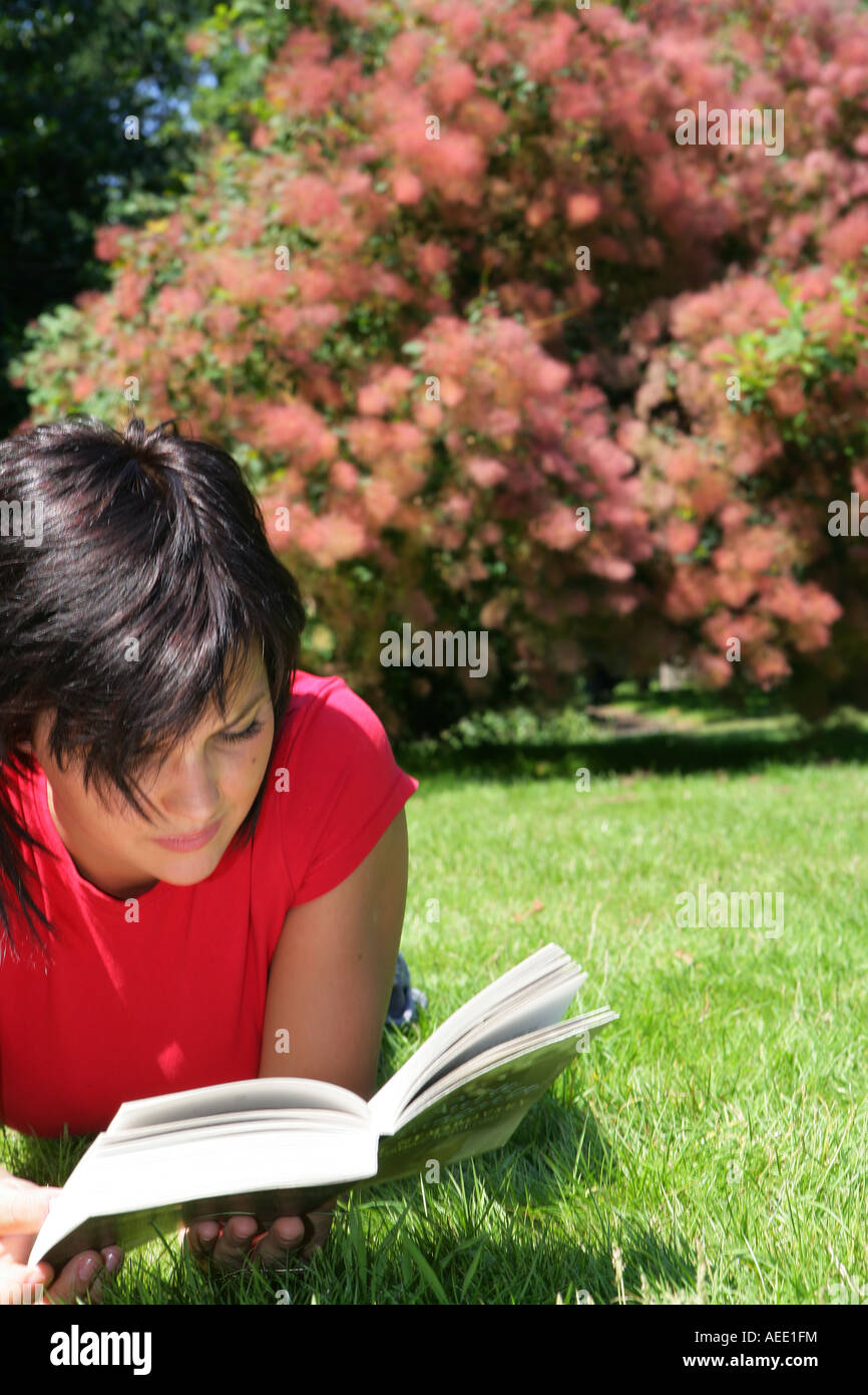 Teenager Reading a Book Model Released Stock Photo - Alamy