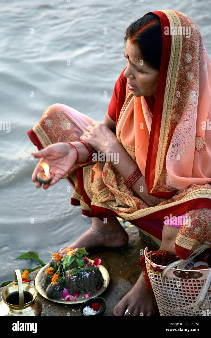 Woman performing ritual puja ceremony hi-res stock photography and ...