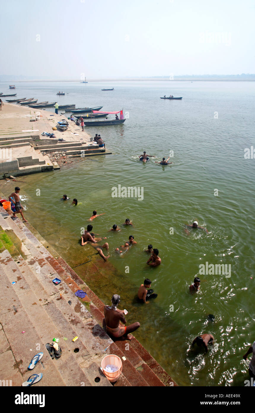 Ritual morning bath. Tulsi Ghat. Ganges river. Varanasi. India Stock ...