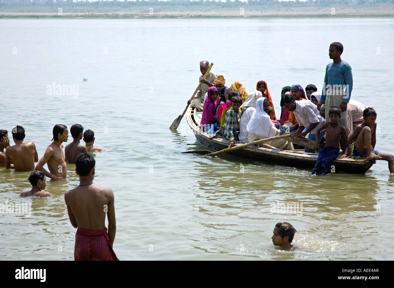 Ritual morning bath and boat. Dandi Ghat. Ganges river. Varanasi. India ...