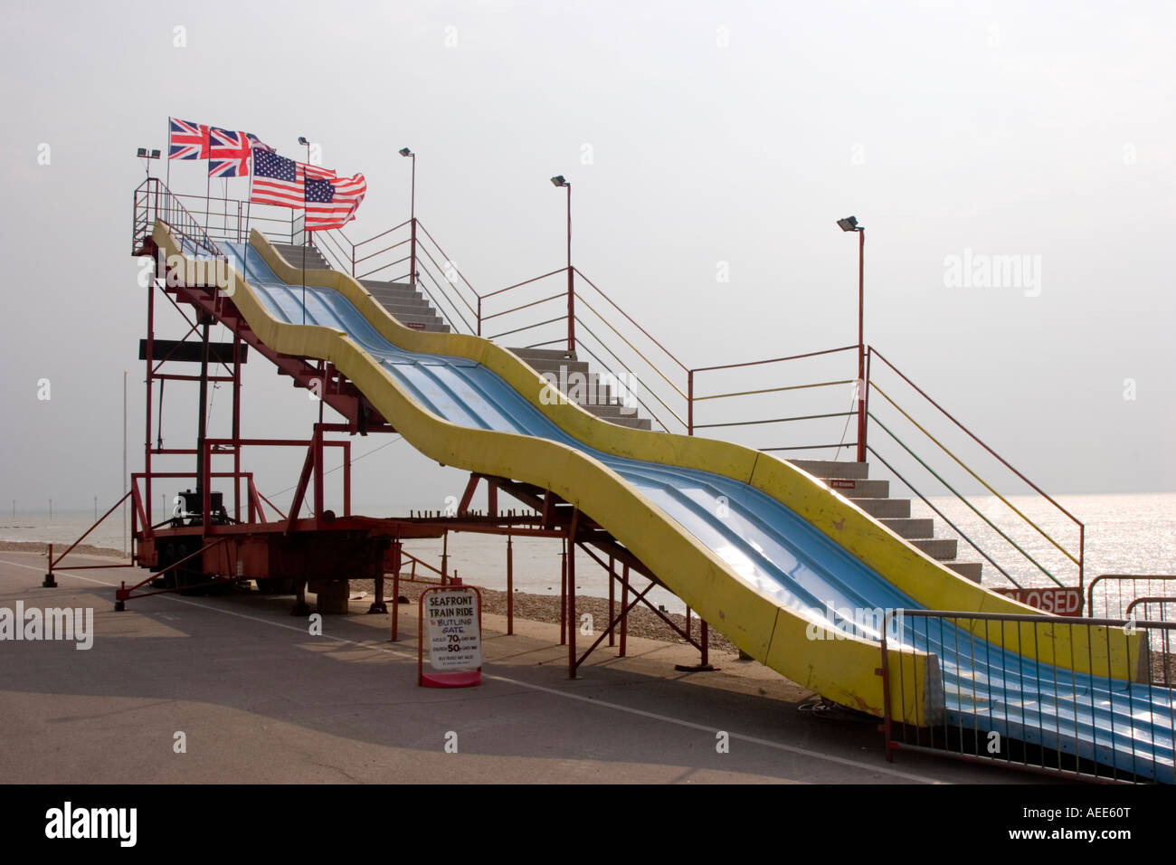 Fairground slide with union jack and stars stripes flags Stock Photo ...