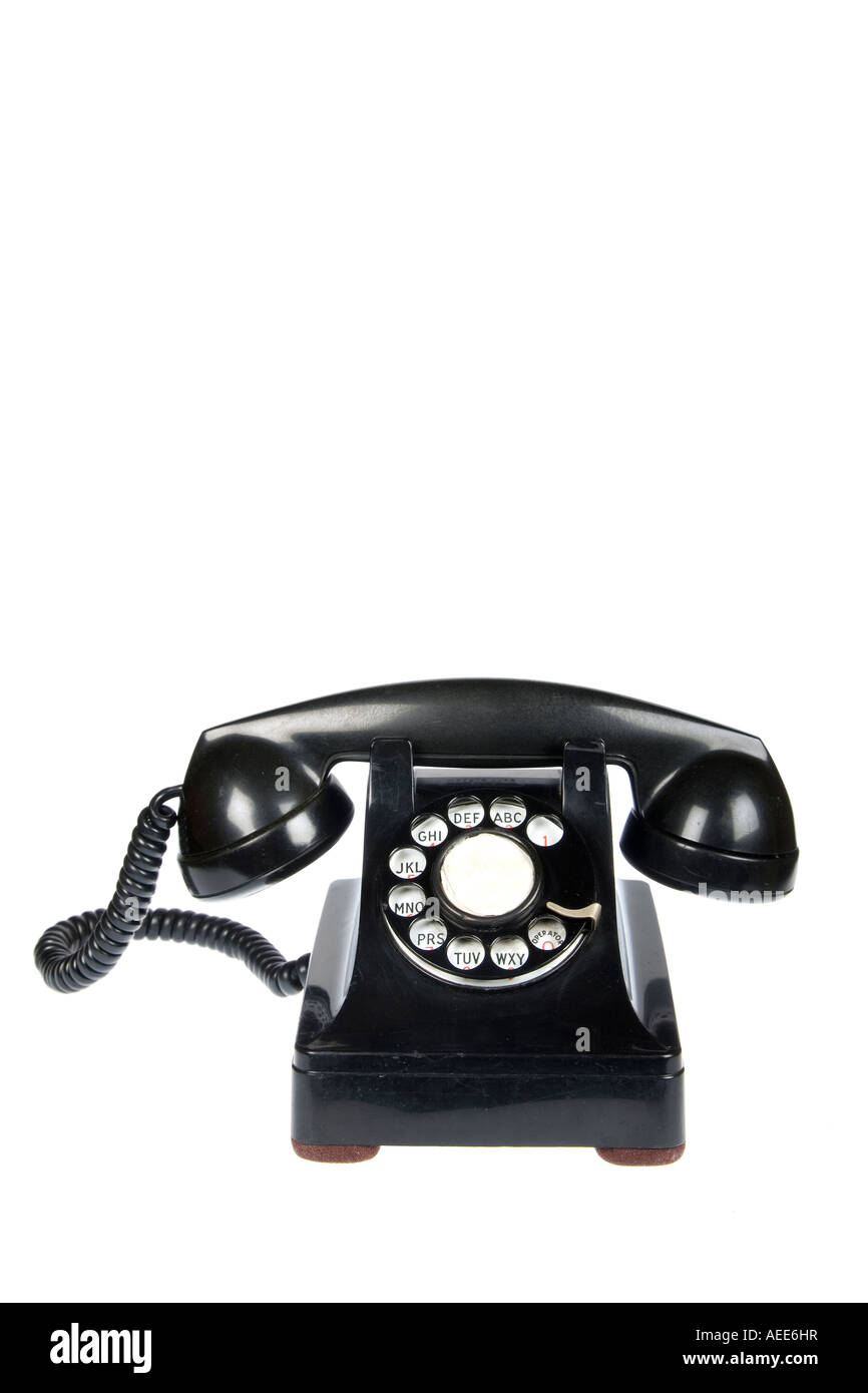 Vintage retro rotary telephone on white background Stock Photo - Alamy