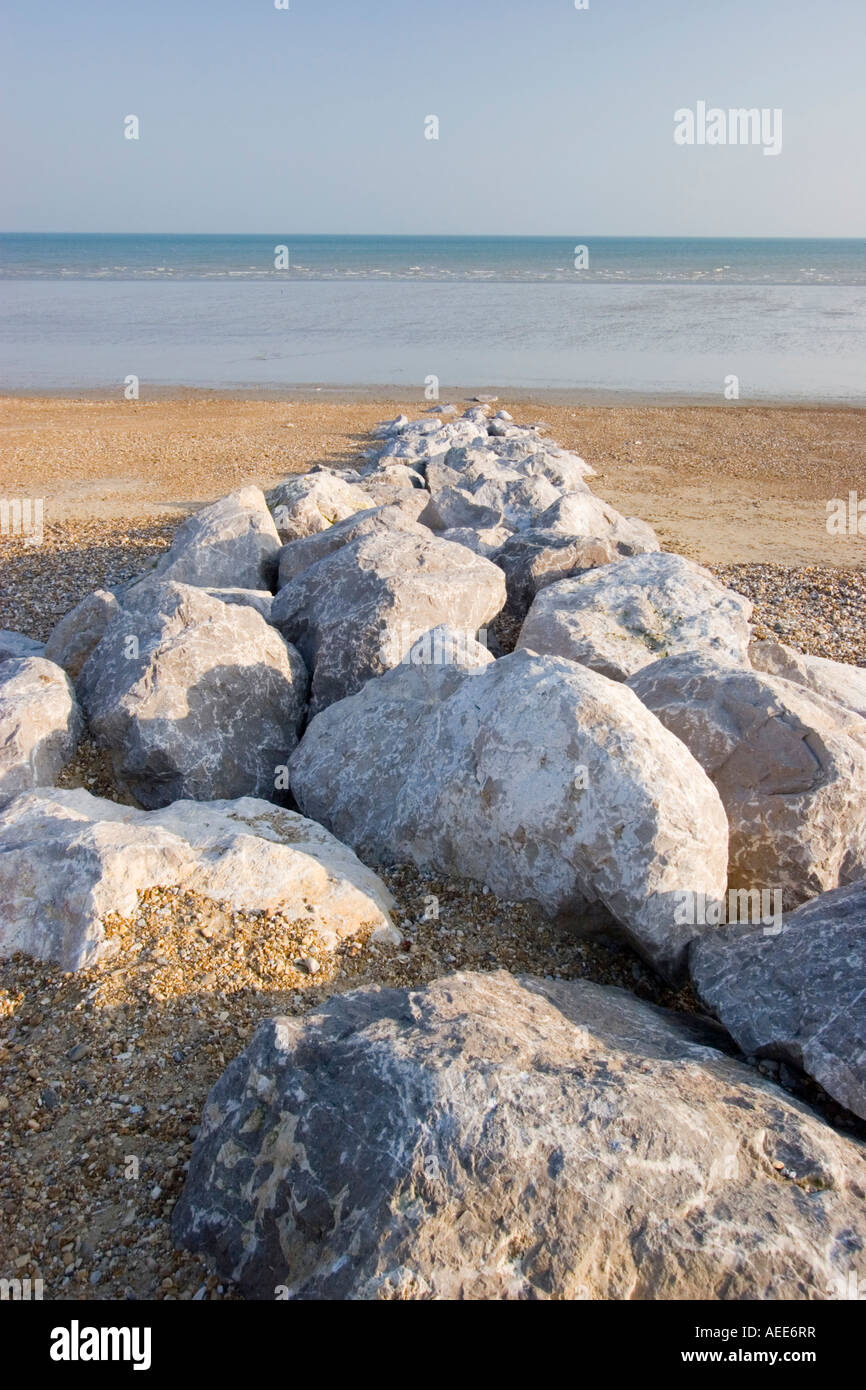 Sea defence scheme consisting of piles of large rocks and boulders ...