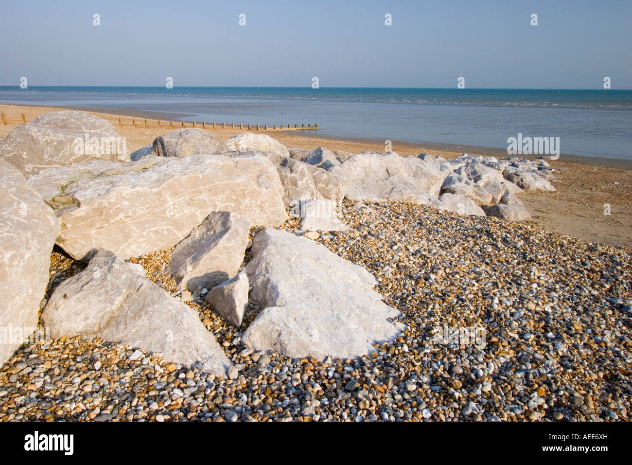 Sea defence scheme consisting of piles of large rocks and boulders ...