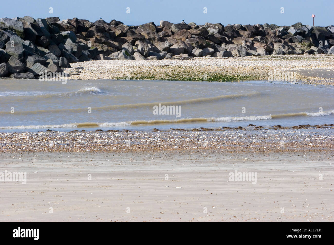 Sea defence scheme consisting of piles of large rocks and boulders ...