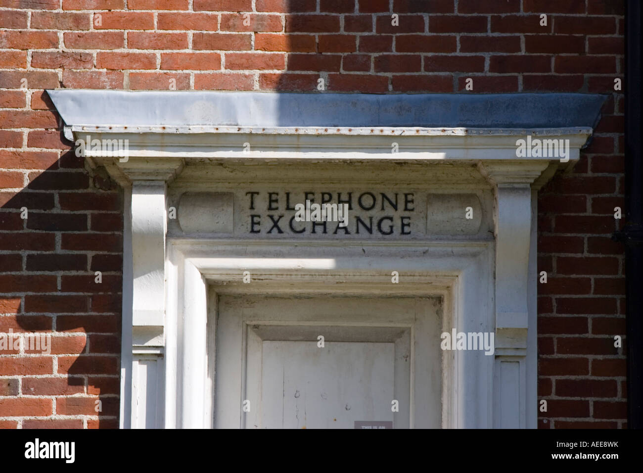 Doorway entrance and sign of local telephone exchange Stock Photo - Alamy