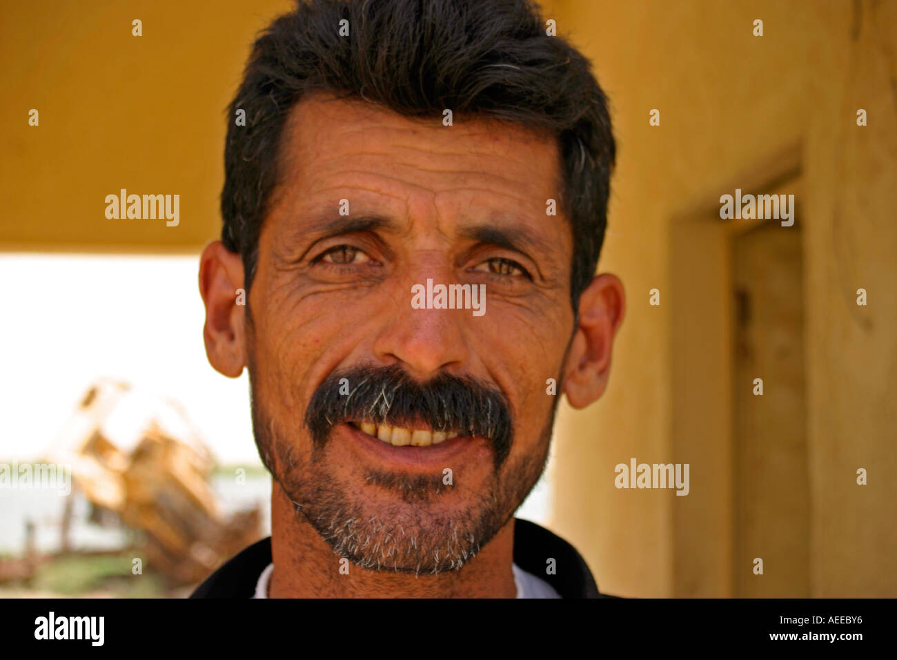 Smiling Iraqi male Rumaylah oil fields Iraq 2005 Stock Photo - Alamy