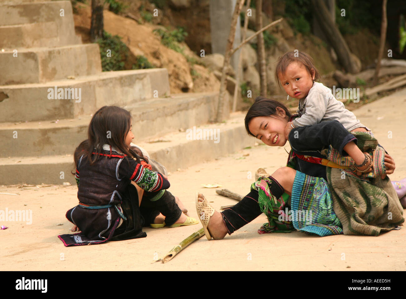 Playing kids in a small village near Sapa Stock Photo - Alamy