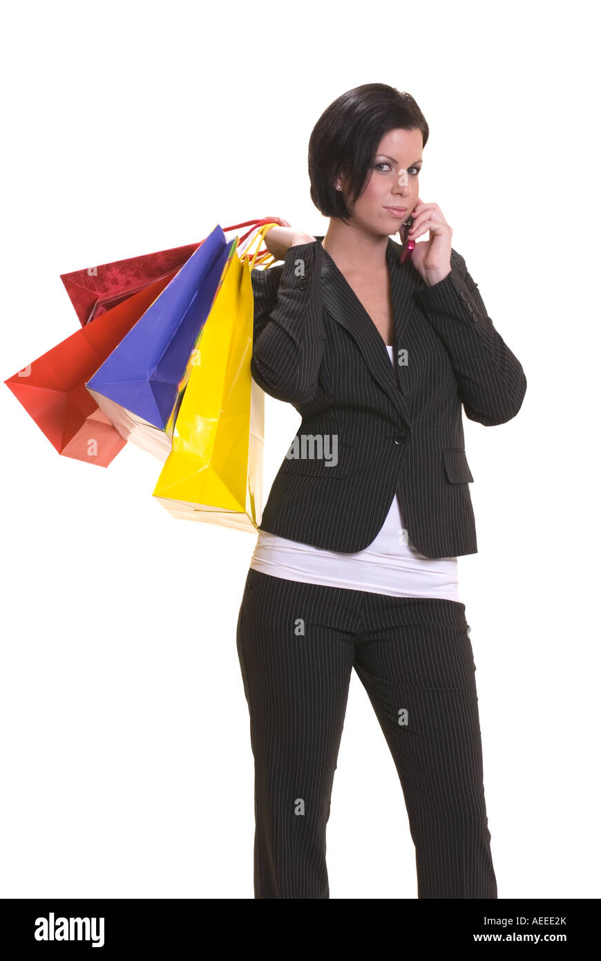 Shopper with shopping bags Cut Out Stock Images & Pictures - Alamy