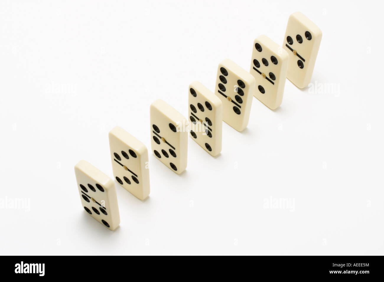 Row of dominoes tiles Cut Out Stock Images & Pictures - Alamy
