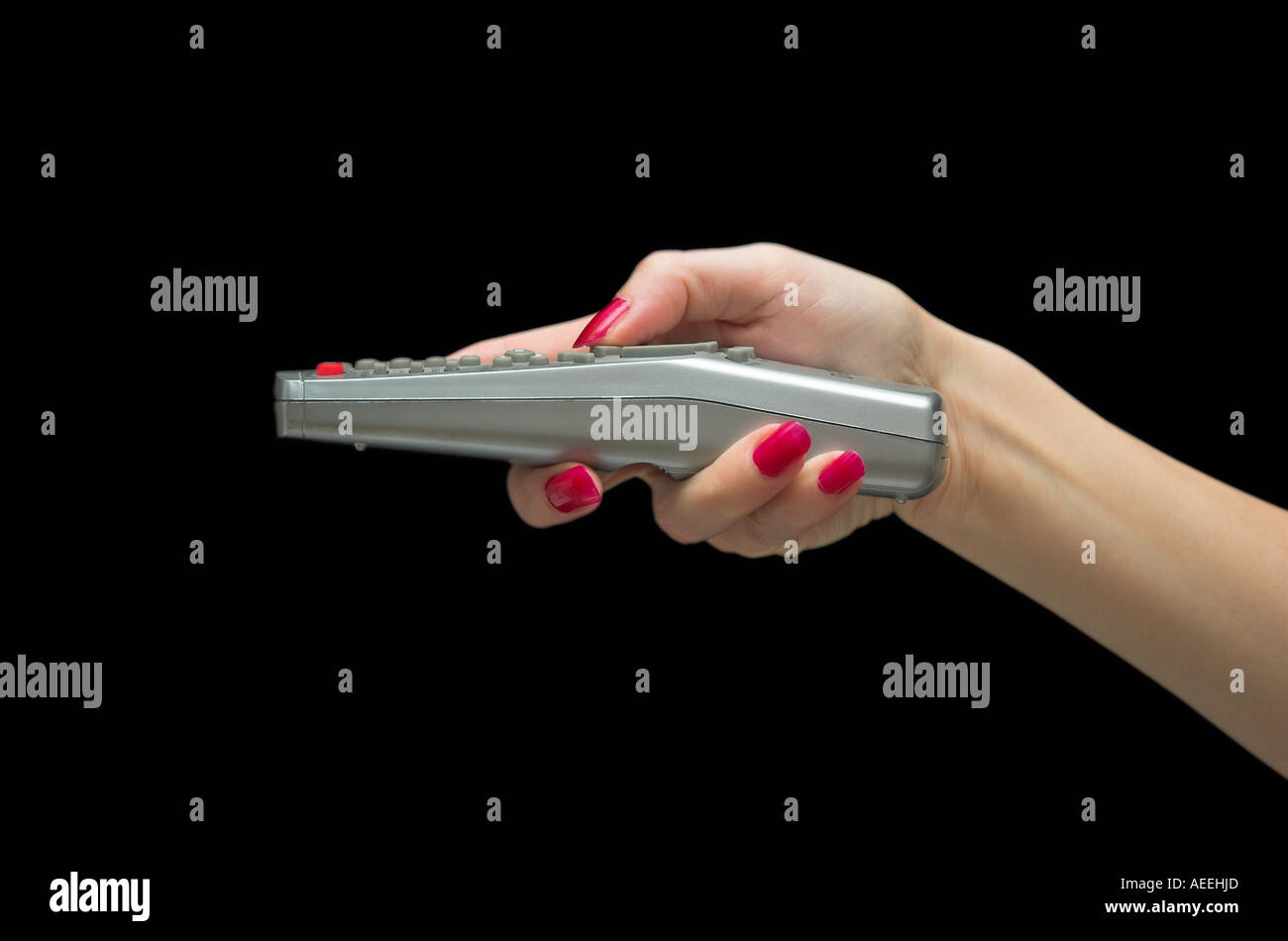 Hand holding tv remote hi-res stock photography and images - Alamy
