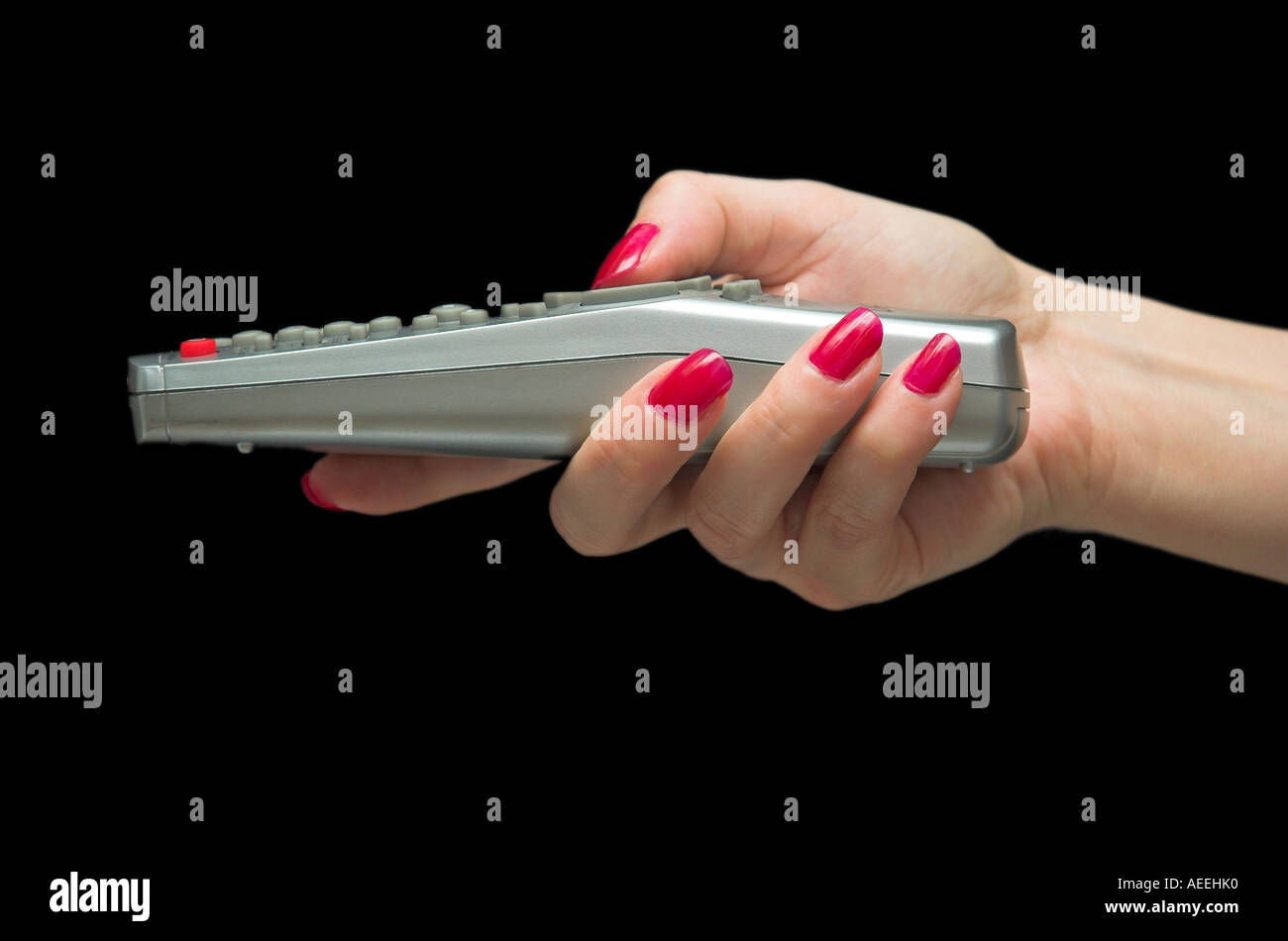 Woman`s Hand Holding TV Remote Control Stock Photo - Alamy
