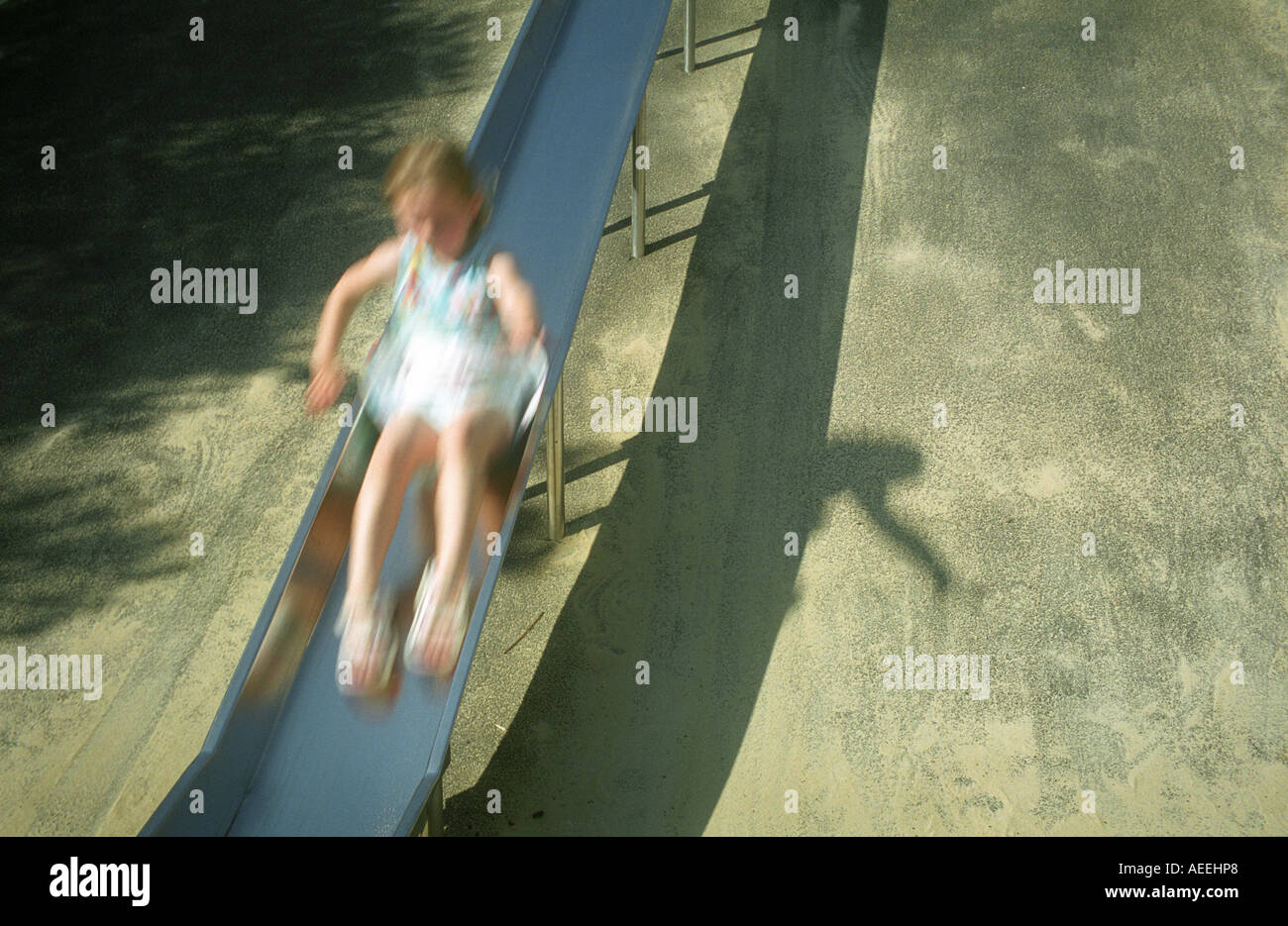 little girl on slide Stock Photo - Alamy