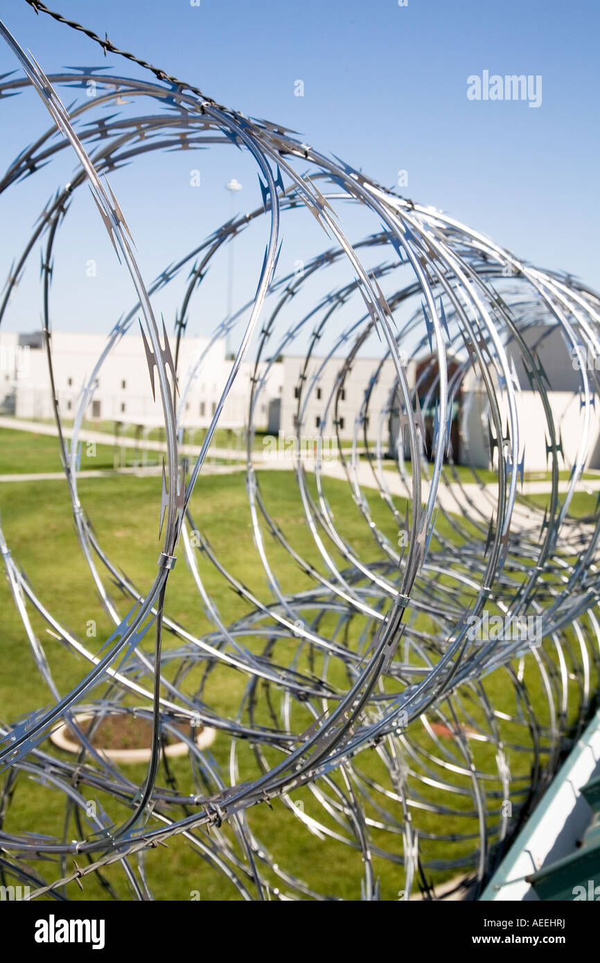 View from roof with razor wire in foreground. Maximum security prison ...