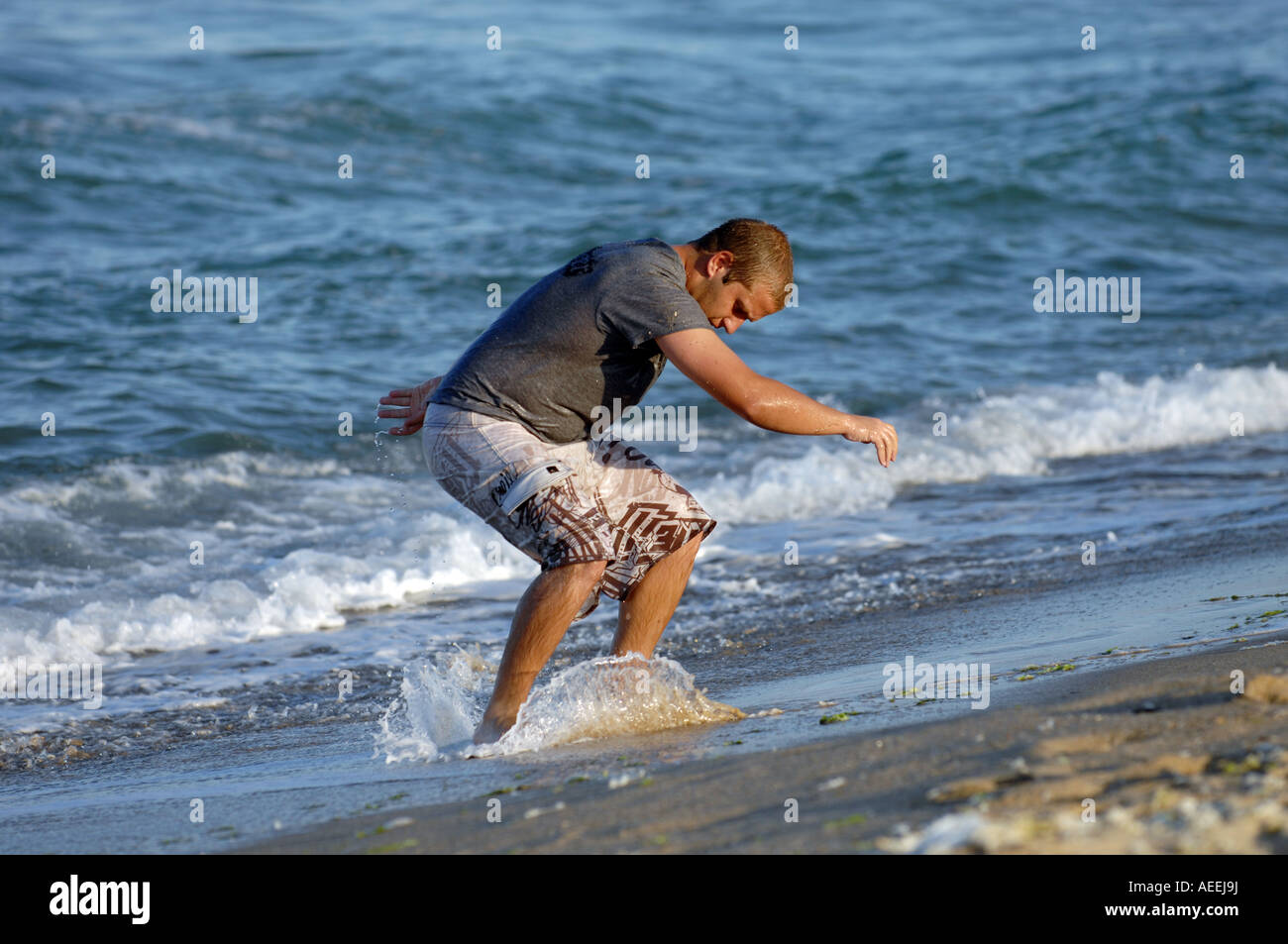 boy on the beach Stock Photo - Alamy