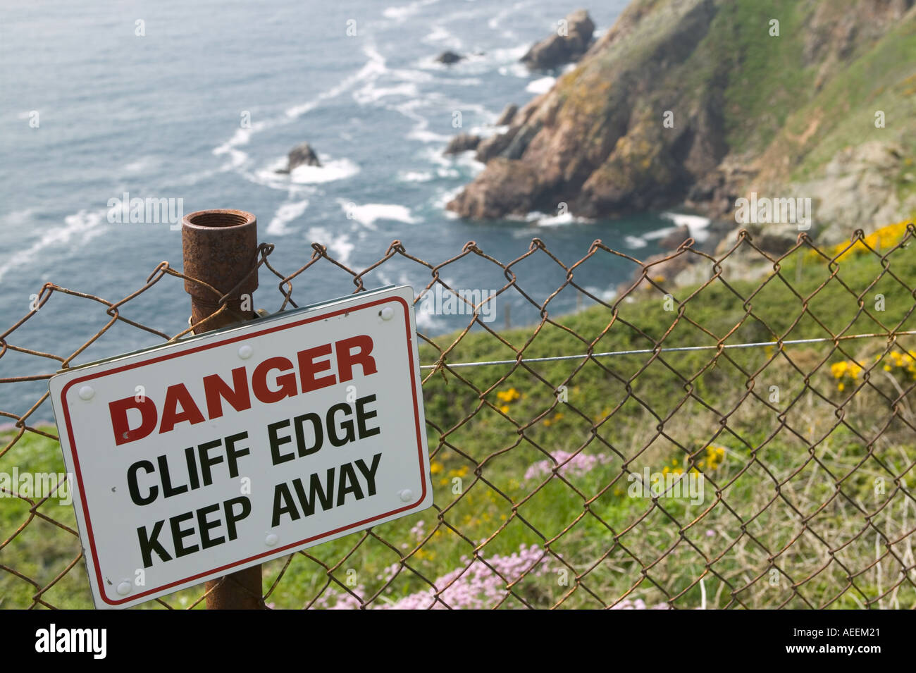 Cliff Edge Warning Sign Guernsey Channel Islands Stock Photo - Alamy