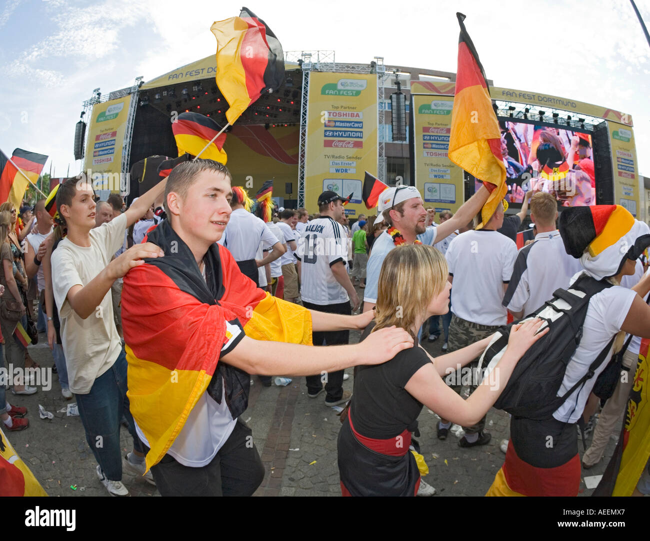 German football fans dancing polonaise at a public viewing event in ...