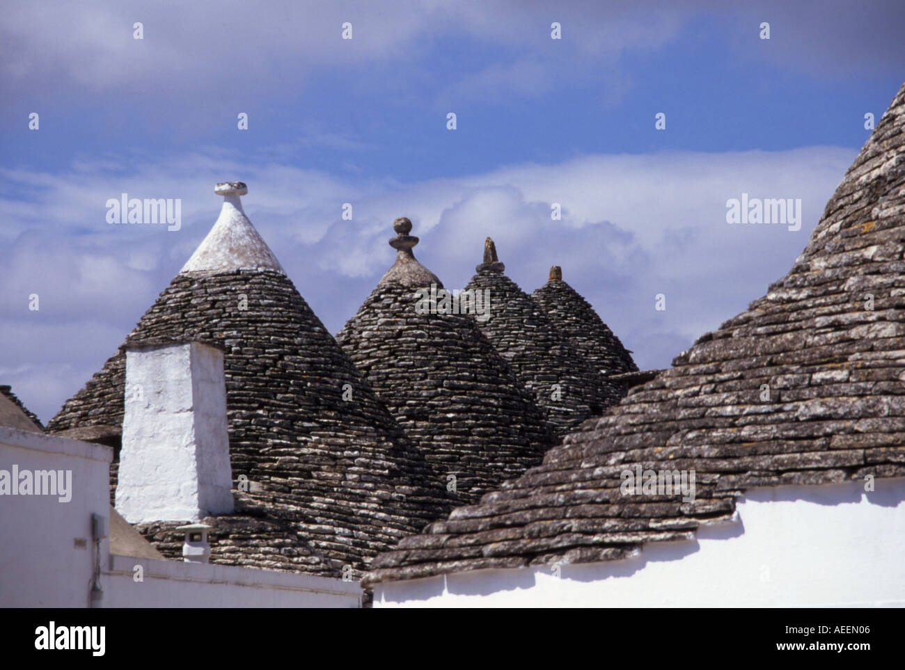 Features of conical stone tiled roofs of Trulli houses Alberobello ...
