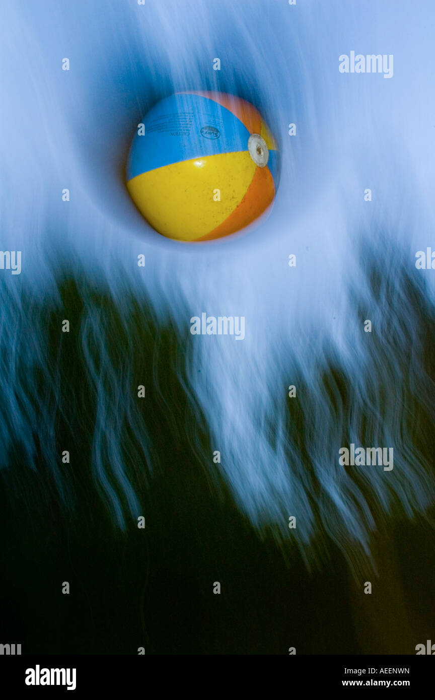 A beachball moves through the sky Stock Photo - Alamy