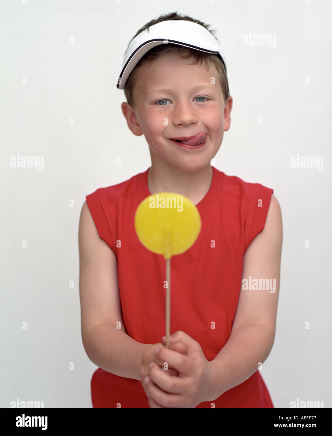 boy looking forward to eat lollipop Stock Photo - Alamy