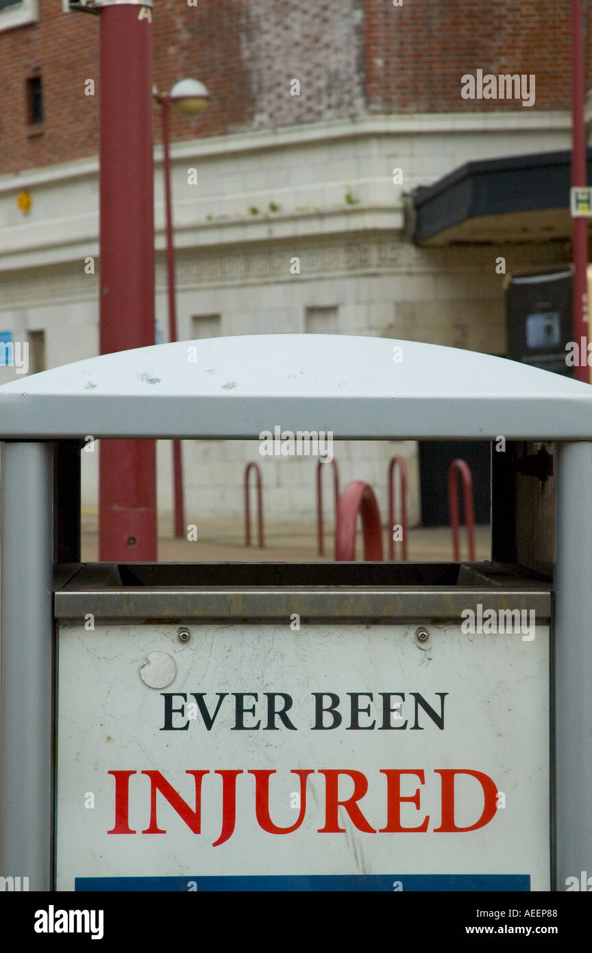 Advertisement for personal injury compensation on litter bin Stock ...