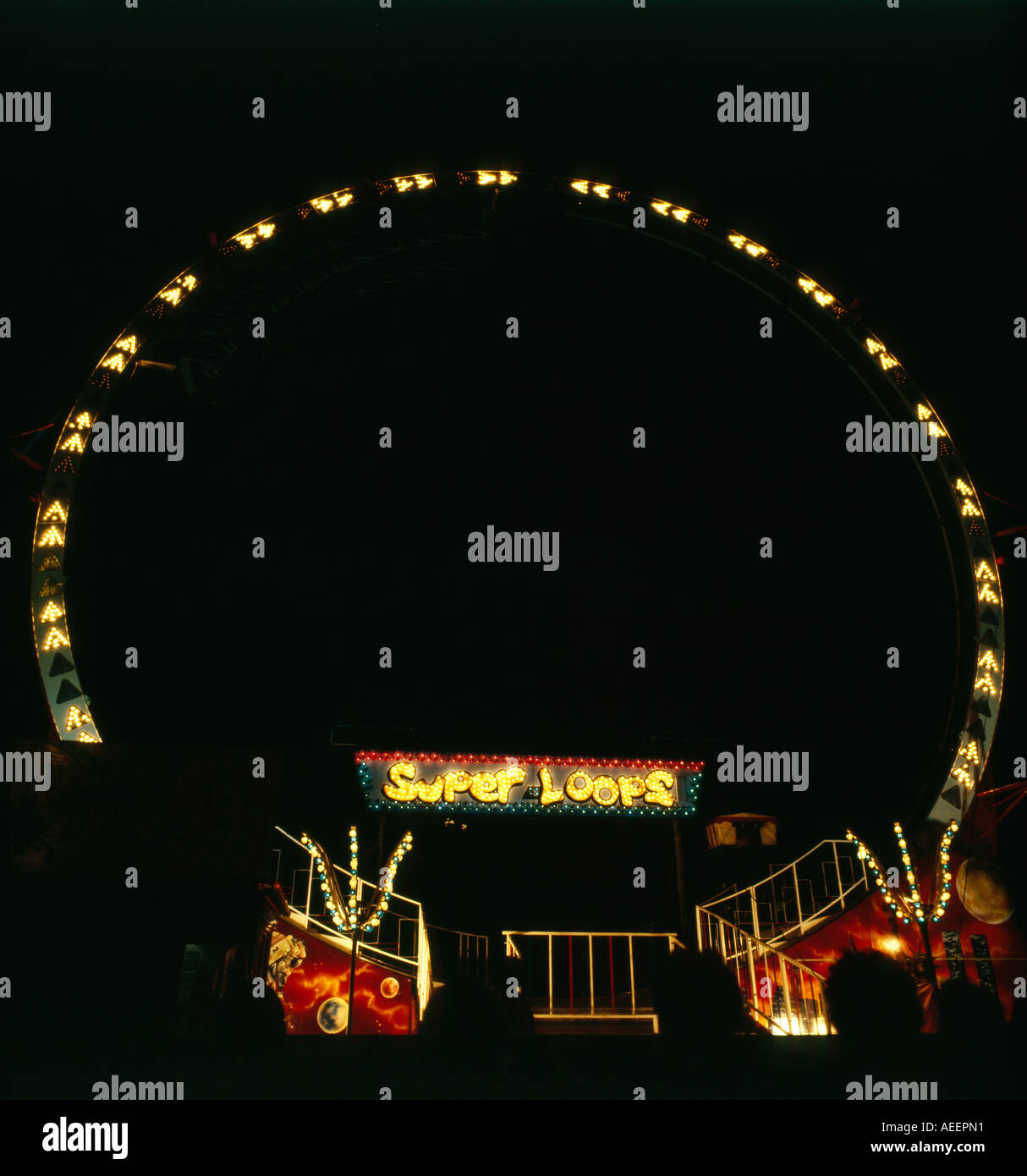 A brightly coloured fairground wheel called super loops brightens up a ...