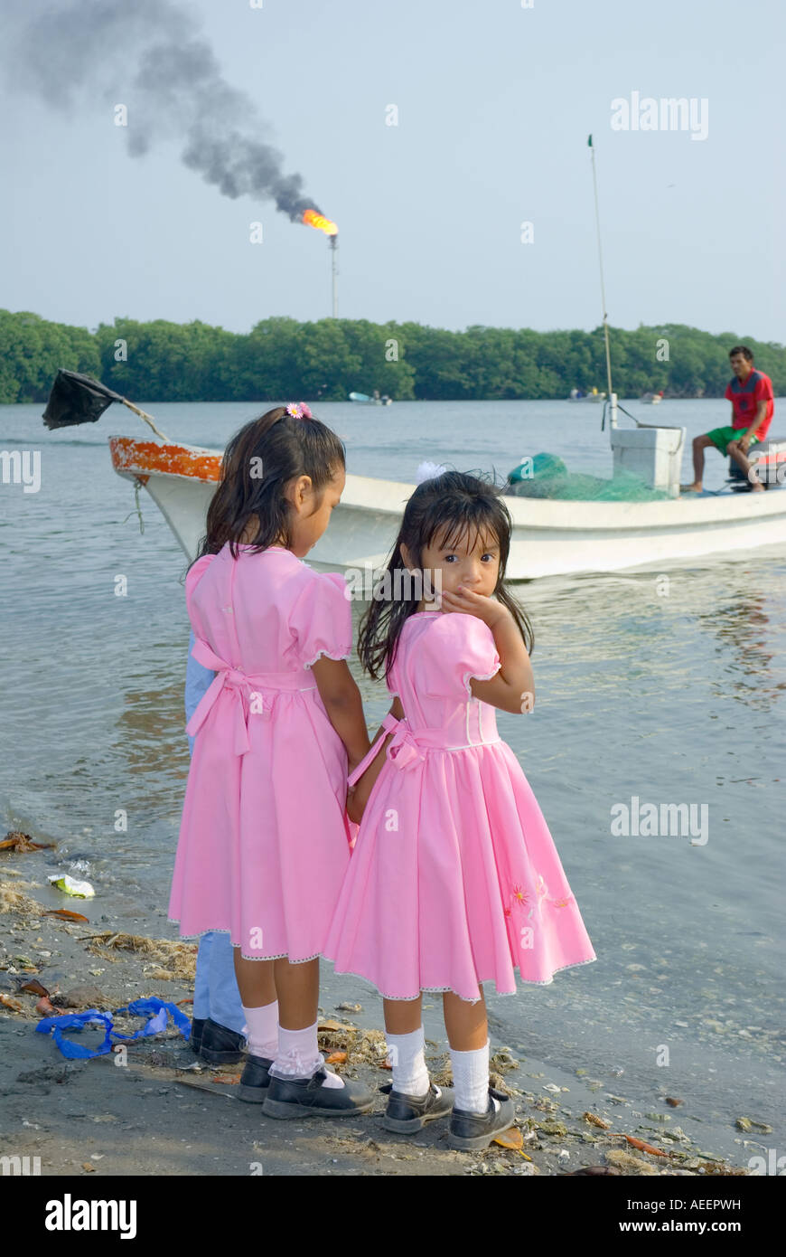 Young girls wait in Colonia Nuevo Turno Largo Tabasco for a water taxi ...