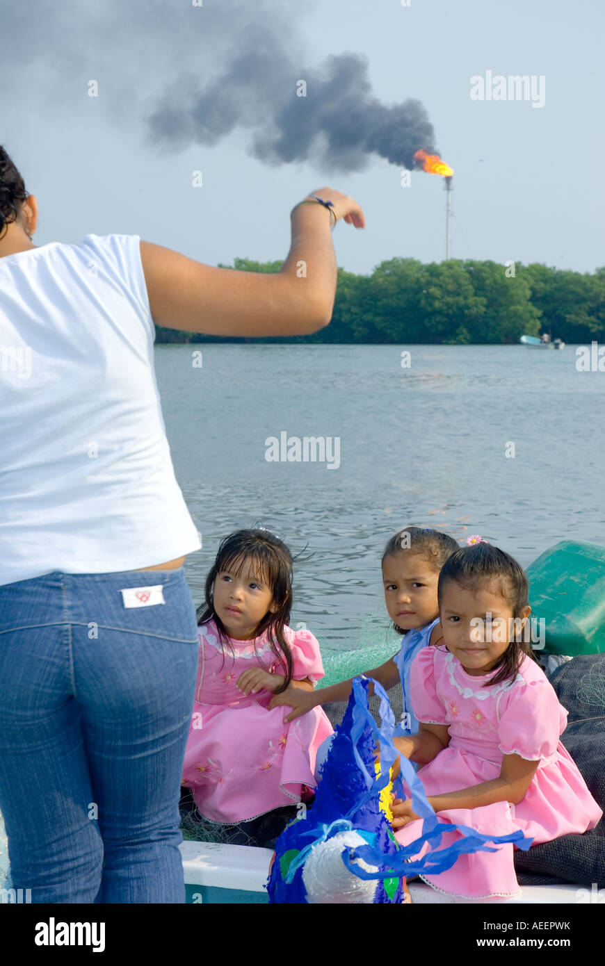 Young girls wait in Colonia Nuevo Turno Largo Tabasco for a water taxi ...
