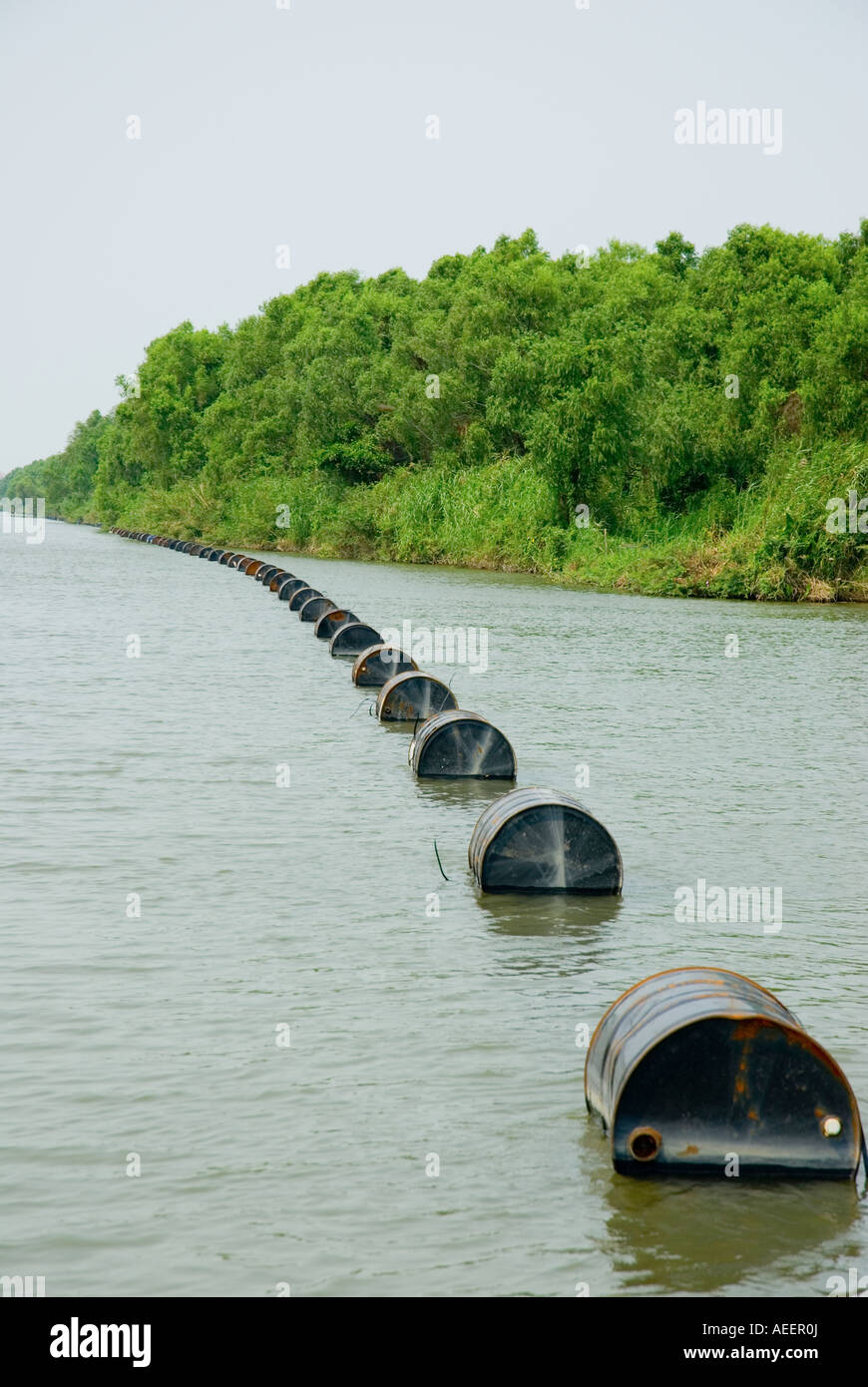 A PEMEX floating pipeline on the Narvaez Canal in the Centla Biosphere ...