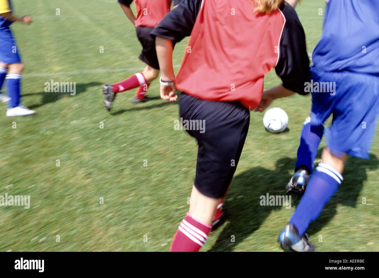 scene of teenagers playing football Stock Photo - Alamy
