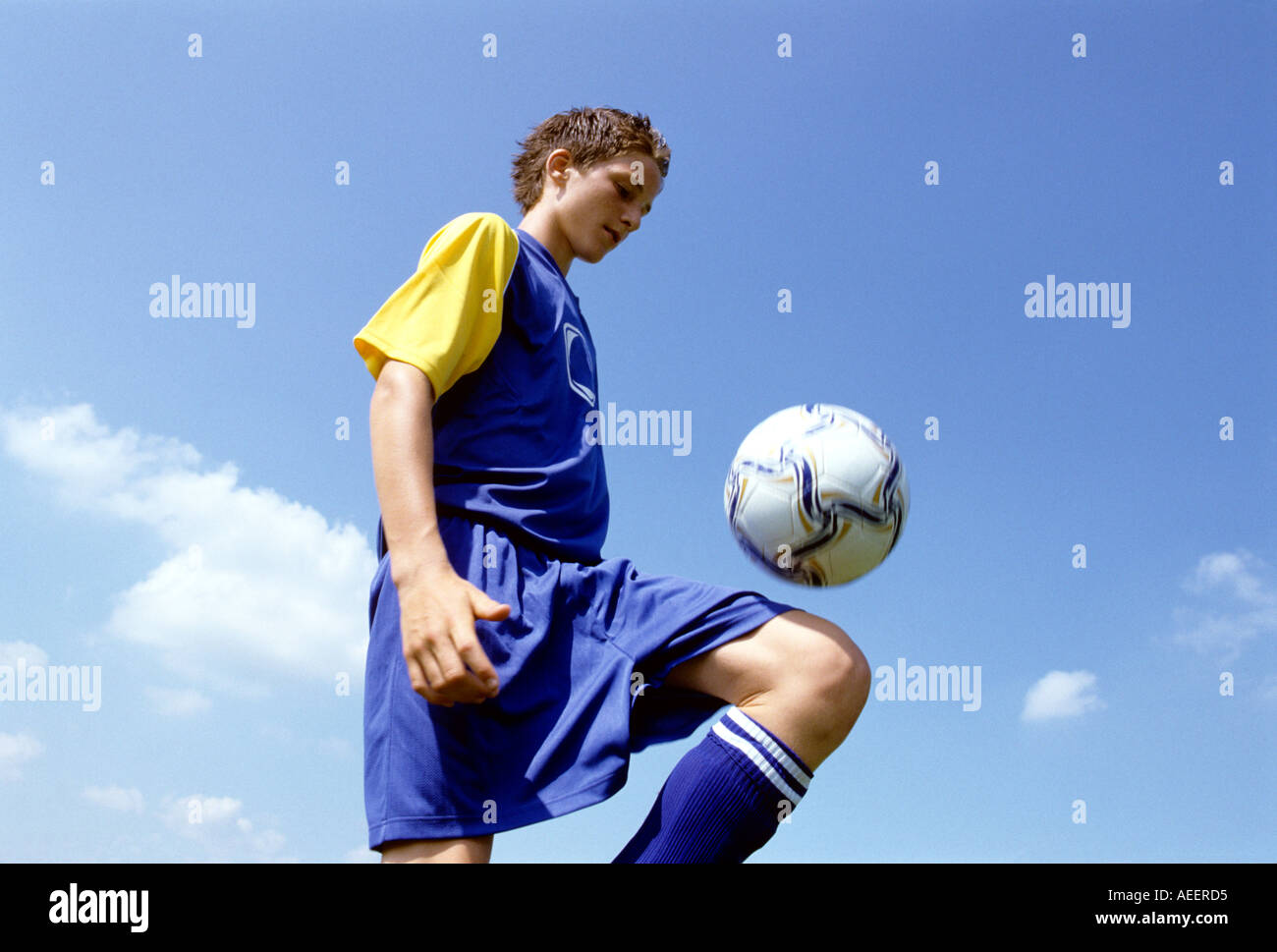 Teenager and football and keepy uppy hi-res stock photography and ...