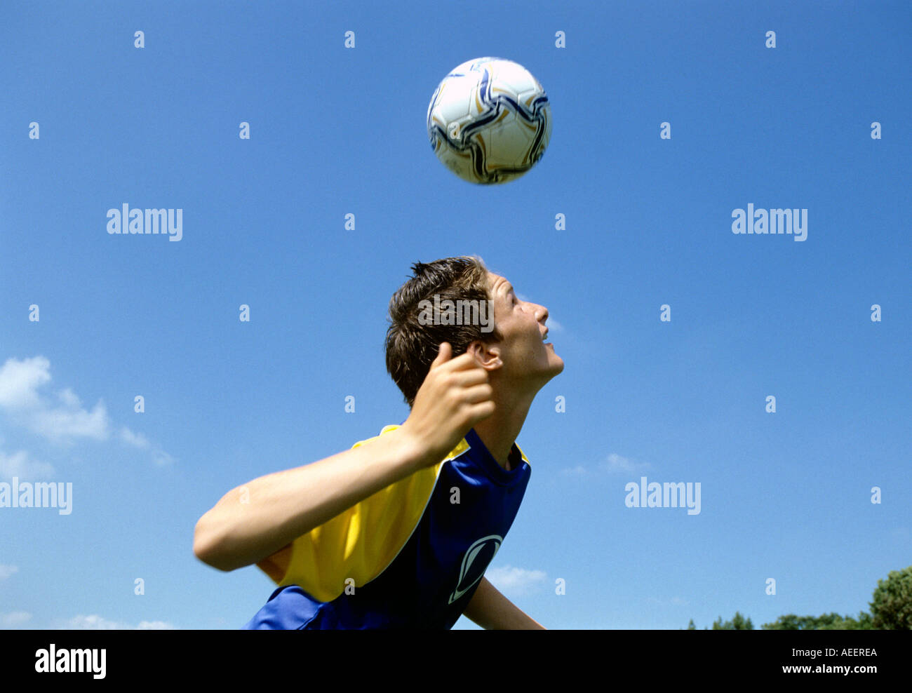 Teenager and football and keepy uppy hi-res stock photography and ...