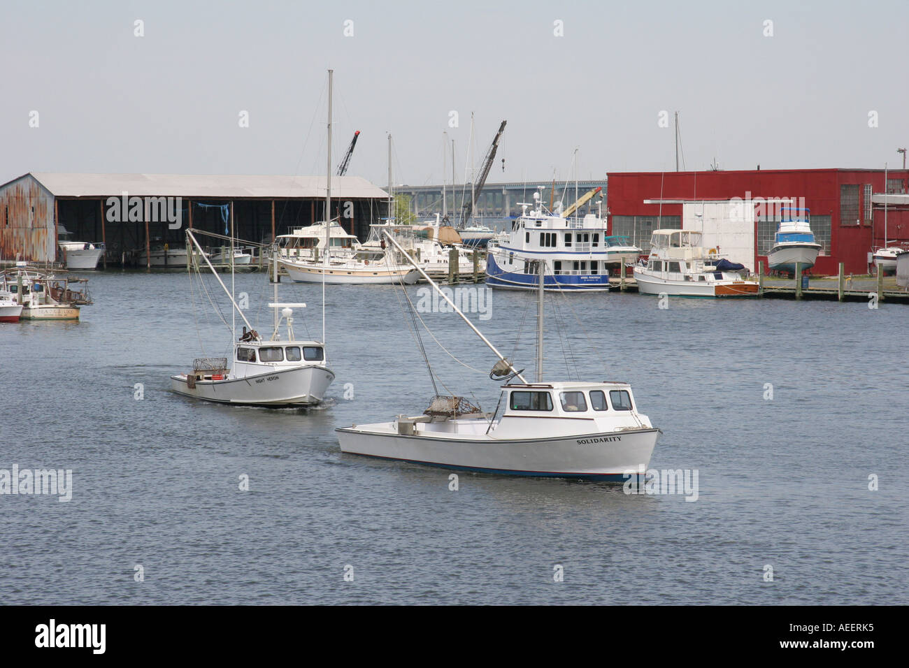 Chesapeake Bay Workboats Waiting for Bridge to Open Stock Photo - Alamy