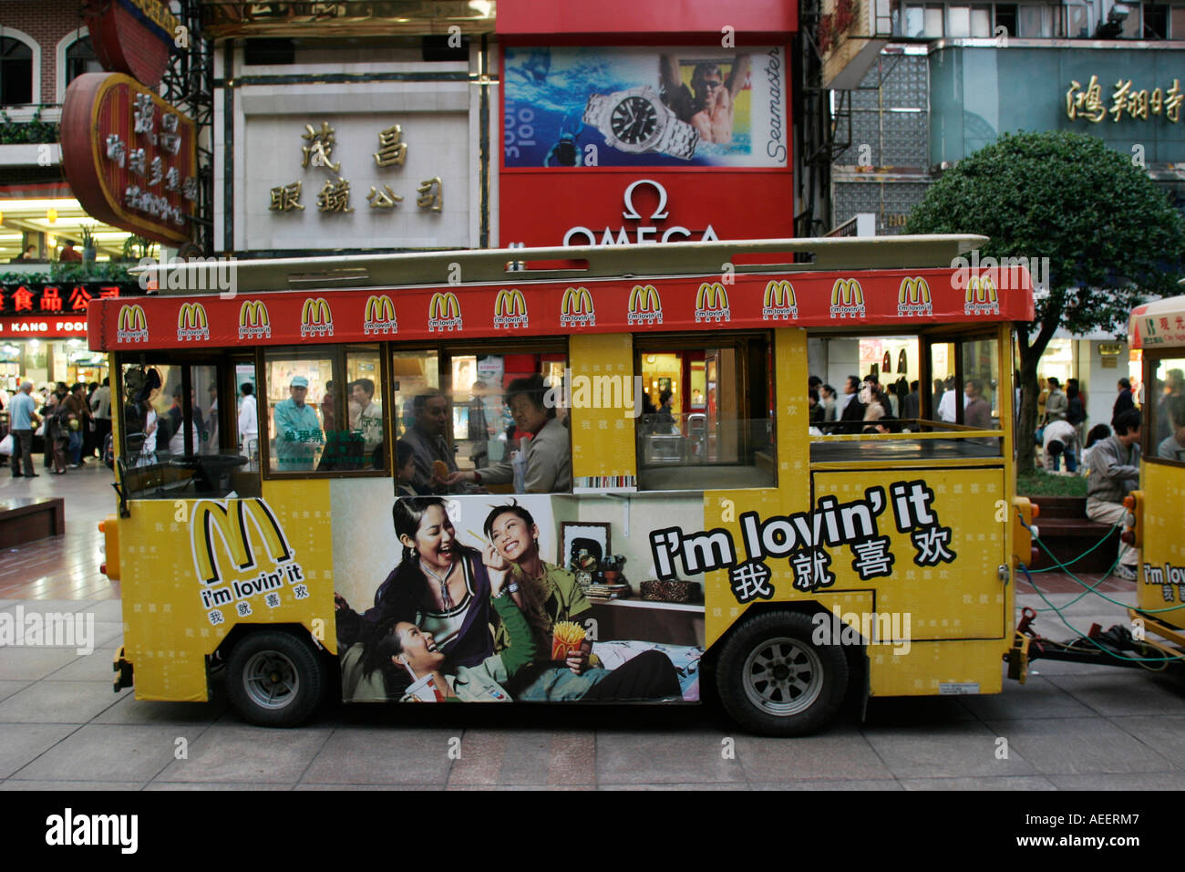 Shanghai China - one of the mini trains taking pedestrians along the ...