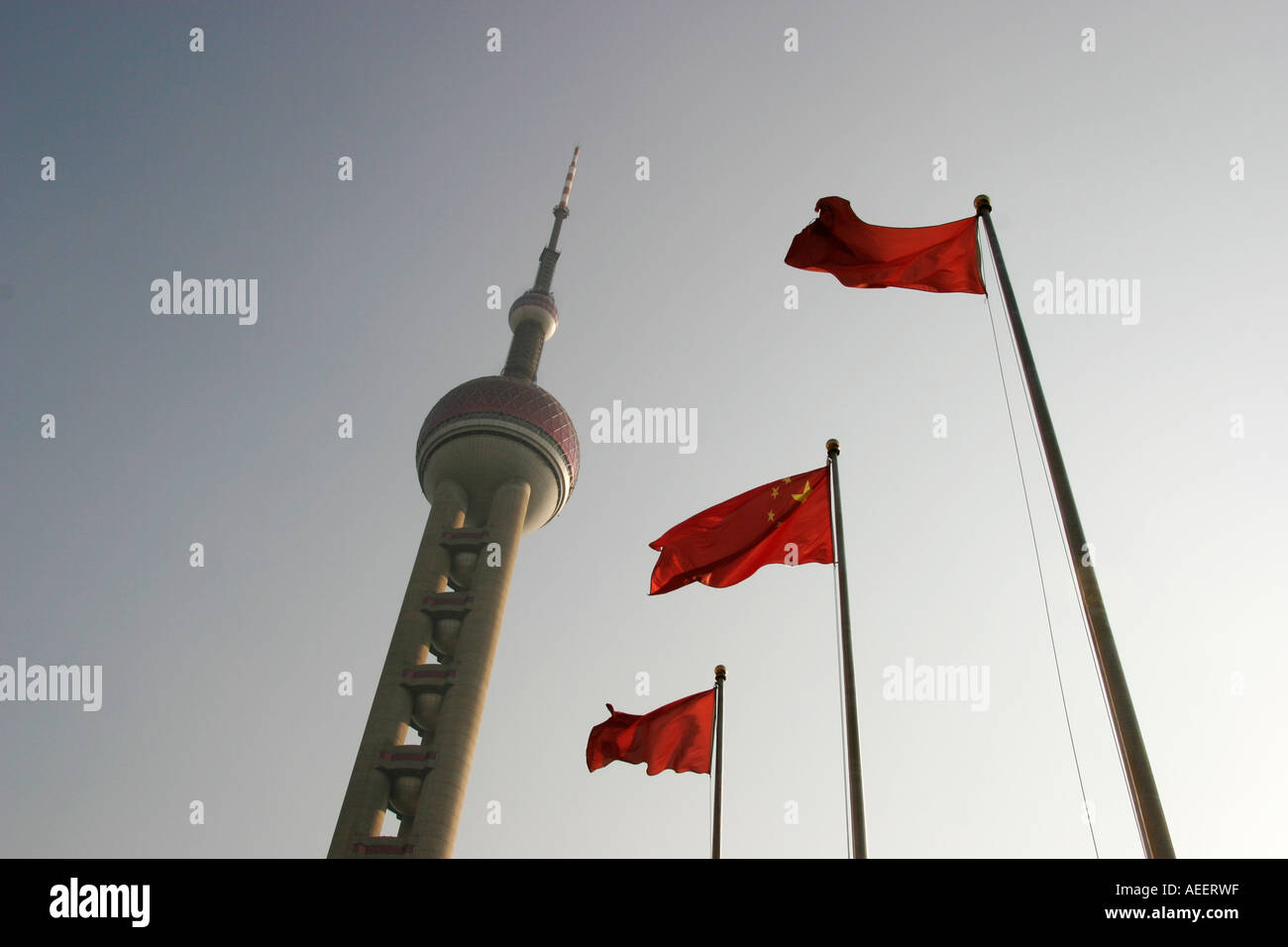 The Oriental Pearl Tower, Pudong, Shanghai with Chines flags flying ...