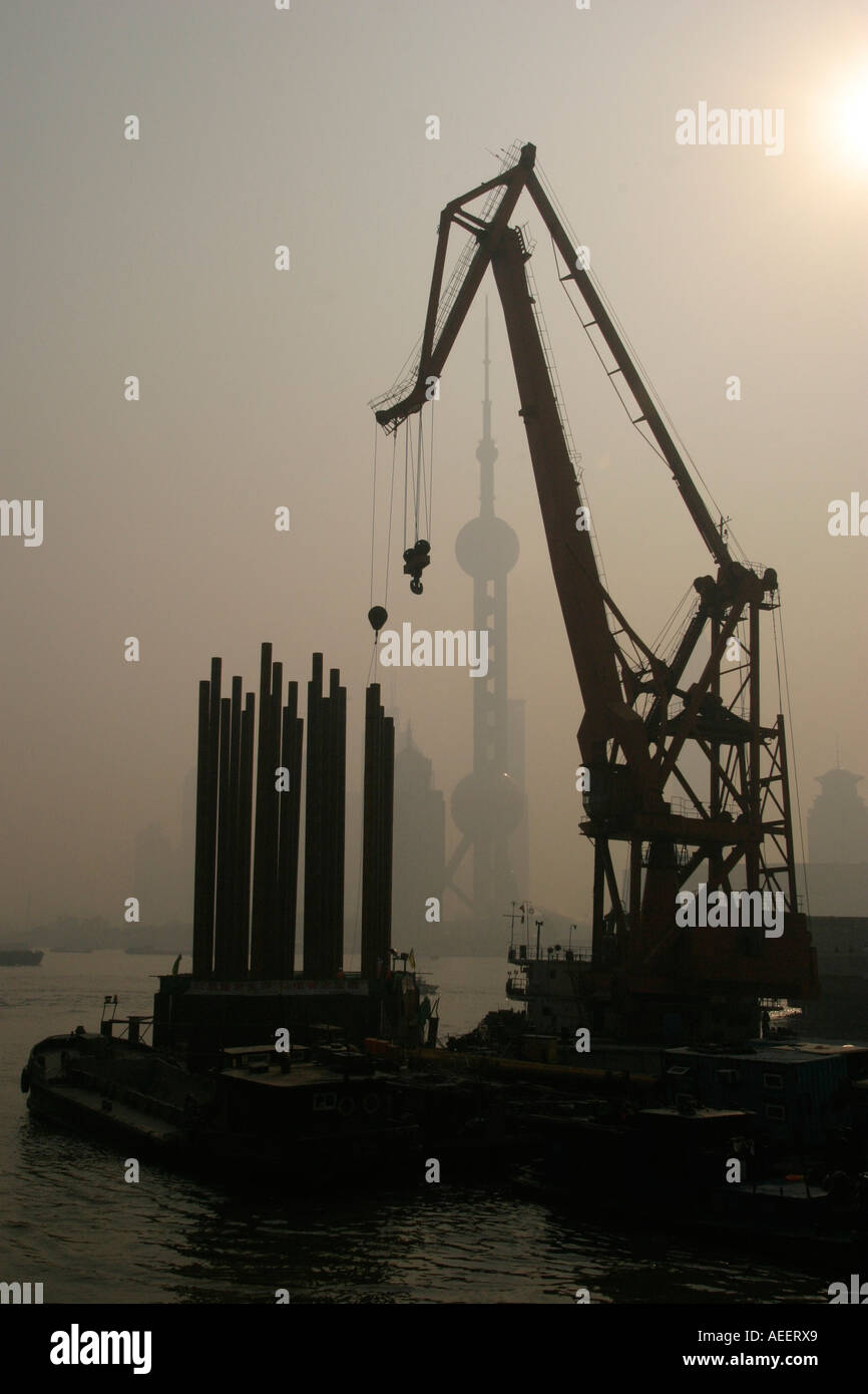 Shanghai China Construction cranes on the Shanghai waterfront as the ...