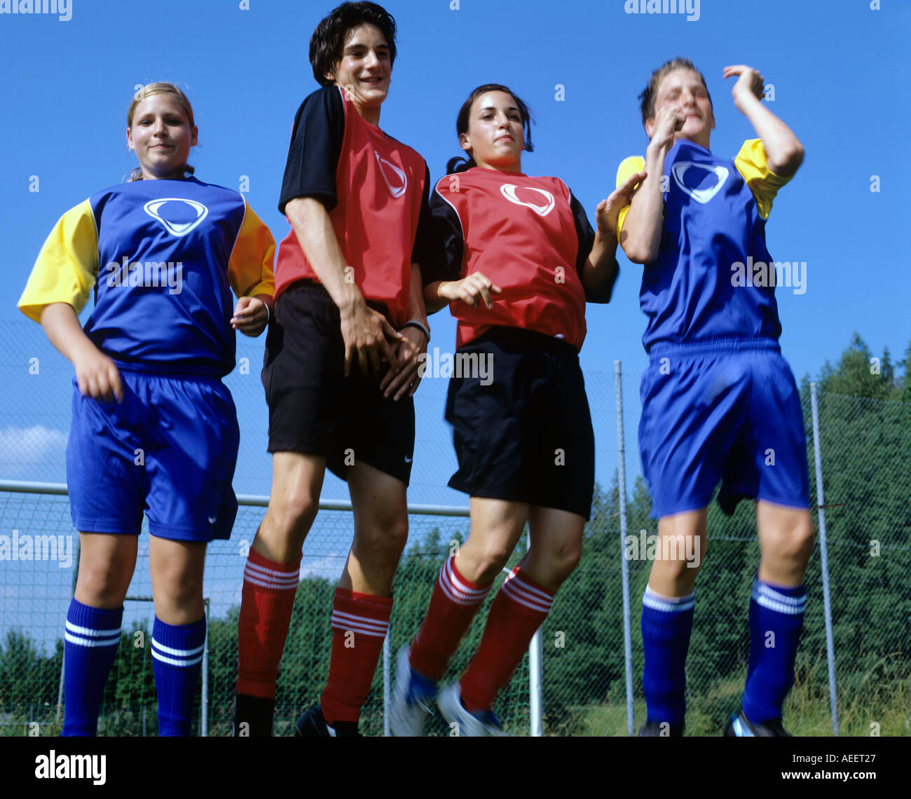 teenage footballers defending free kick Stock Photo - Alamy