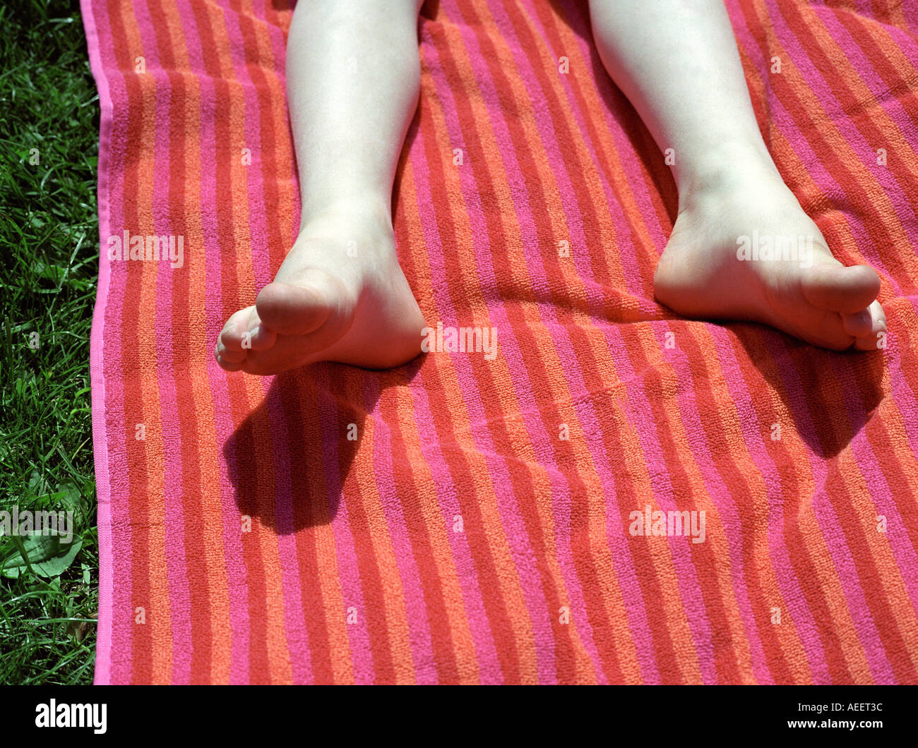 children s feet on towel Stock Photo - Alamy