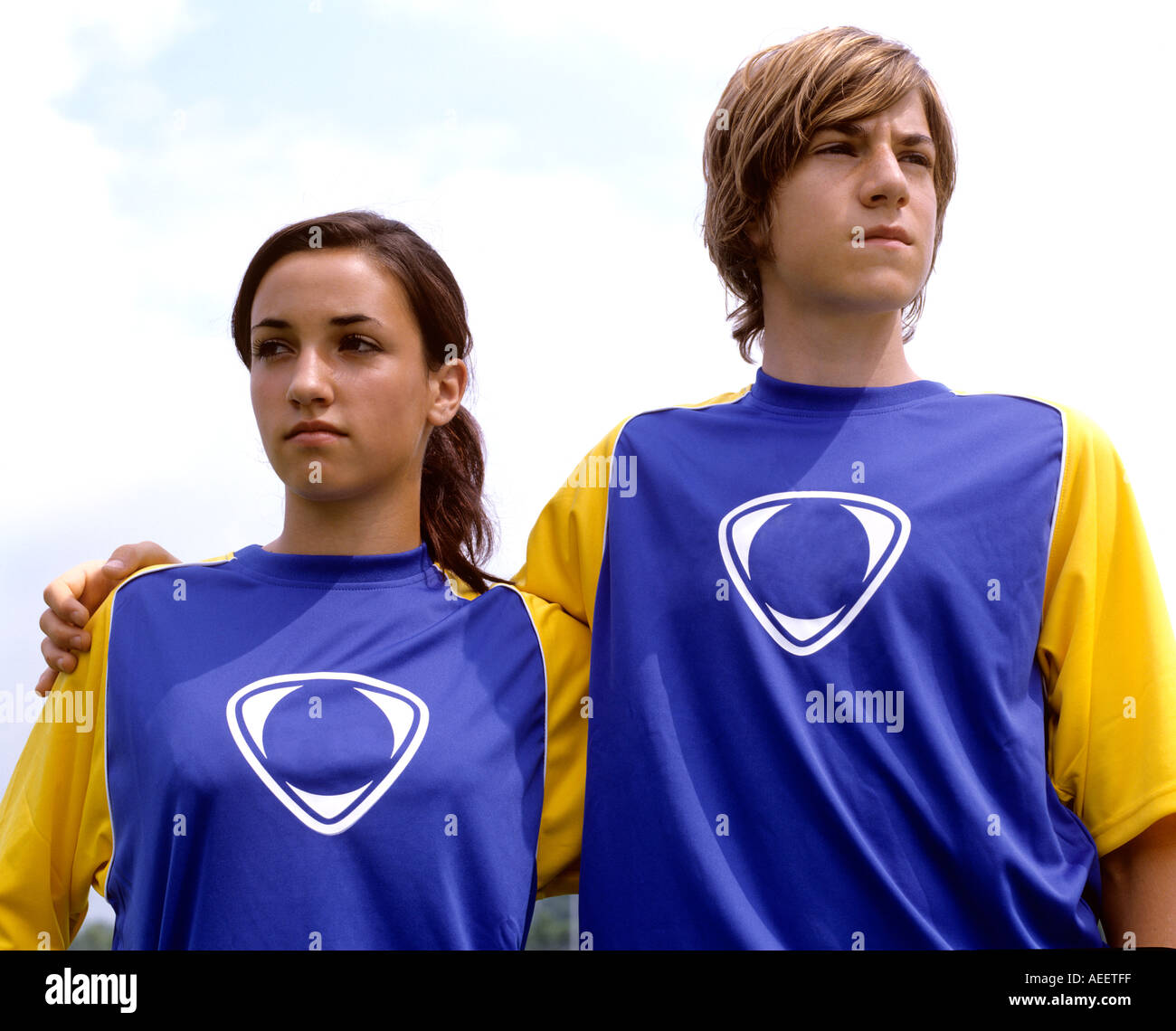 portrait of two teenagers in football kit Stock Photo - Alamy