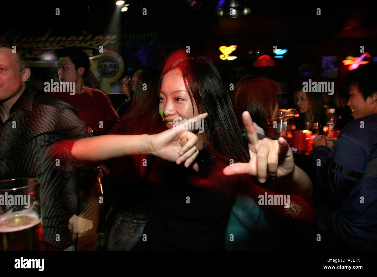 Shanghai China Young women enjoying themselves in one of the bars along ...