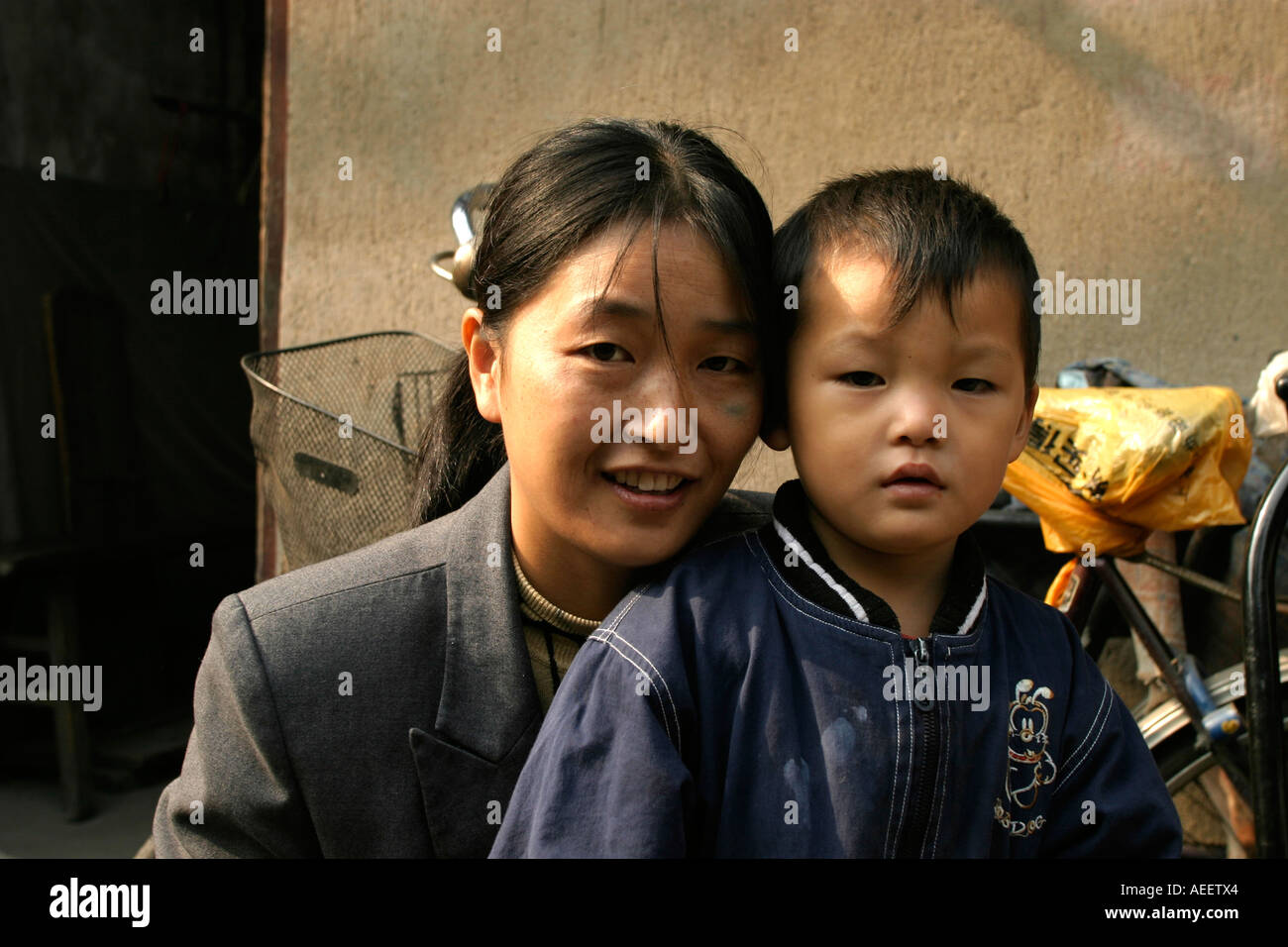 Shanghai China A young boy outside his home in the backstreets of ...