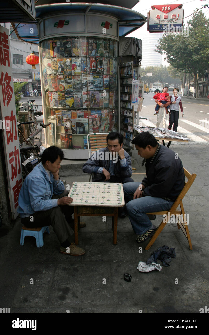 Playing Chinese Checkers on street corner, Shainghai Stock Photo - Alamy