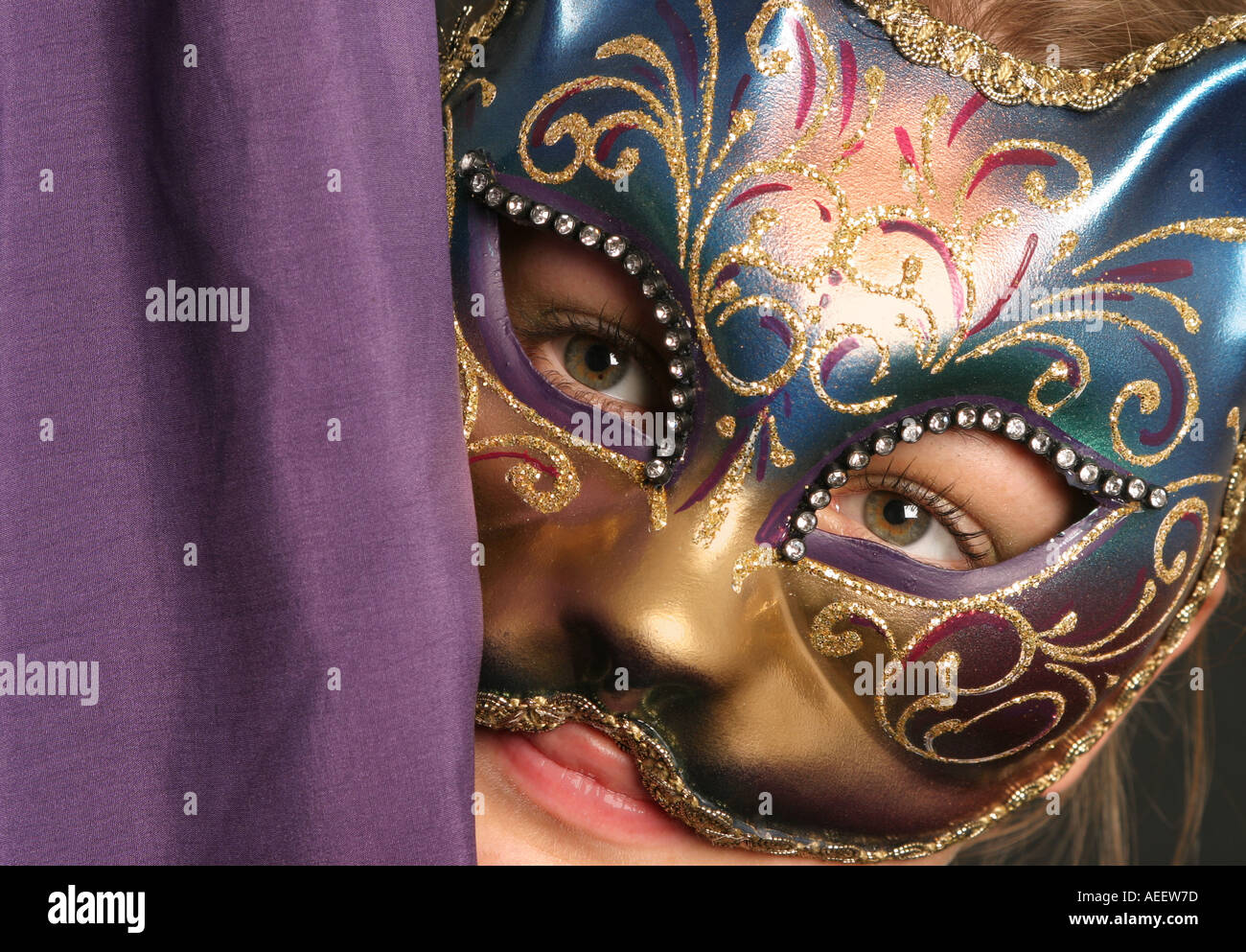 Young girl wearing cat mask hi-res stock photography and images - Alamy