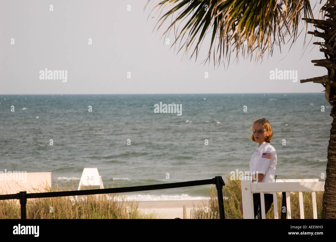 Caucasian Female Police Officer on the Beach Stock Photo - Alamy