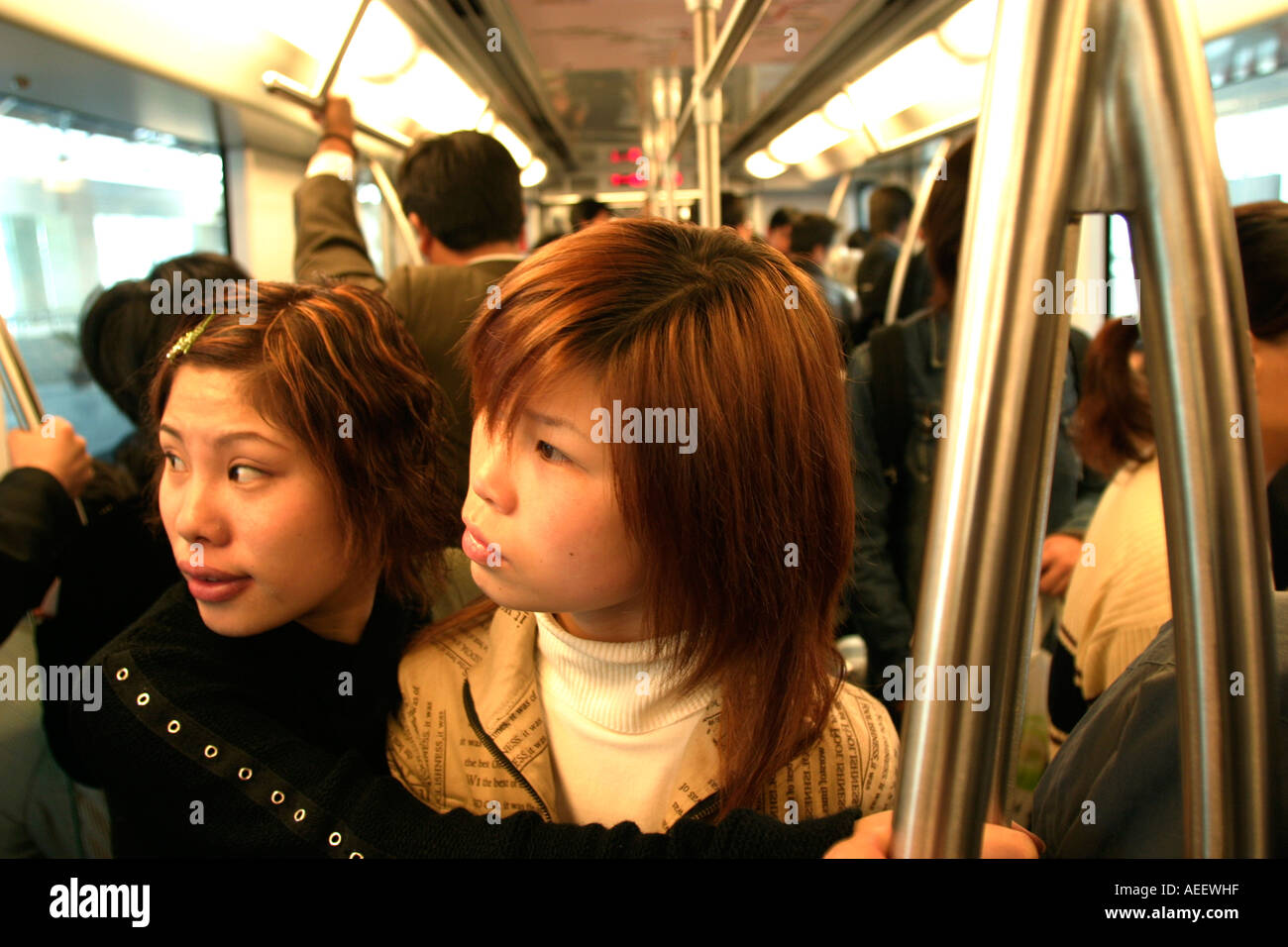 Shanghai China Young women passengers on Shanghai s light rail system ...