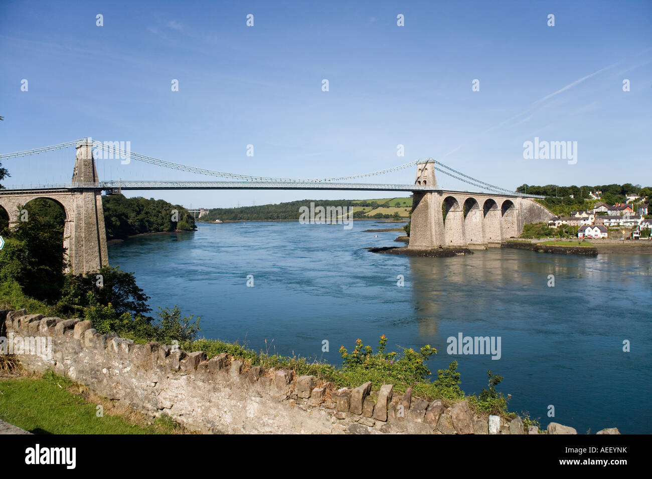 The suspension bridge built by Thomas Telford across the Menai Straits ...