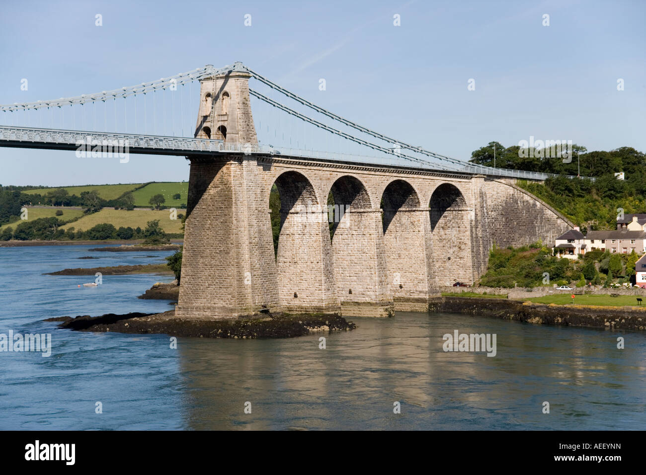 The suspension bridge built by Thomas Telford across the Menai Straits ...