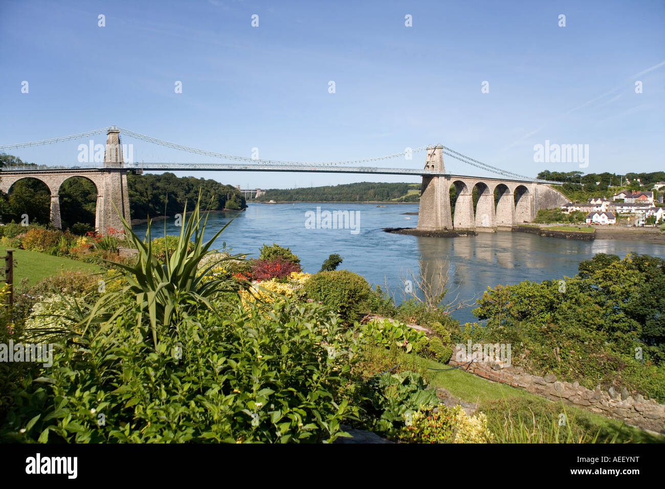 The suspension bridge built by Thomas Telford across the Menai Straits ...