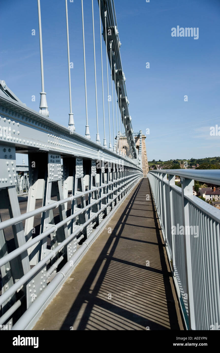The suspension bridge built by Thomas Telford across the Menai Straits ...