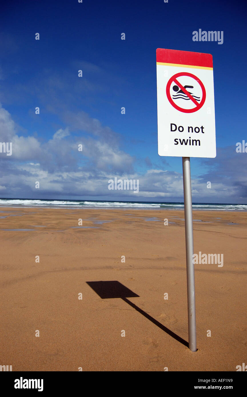 Warning sign Newquay beach seaside Stock Photo - Alamy